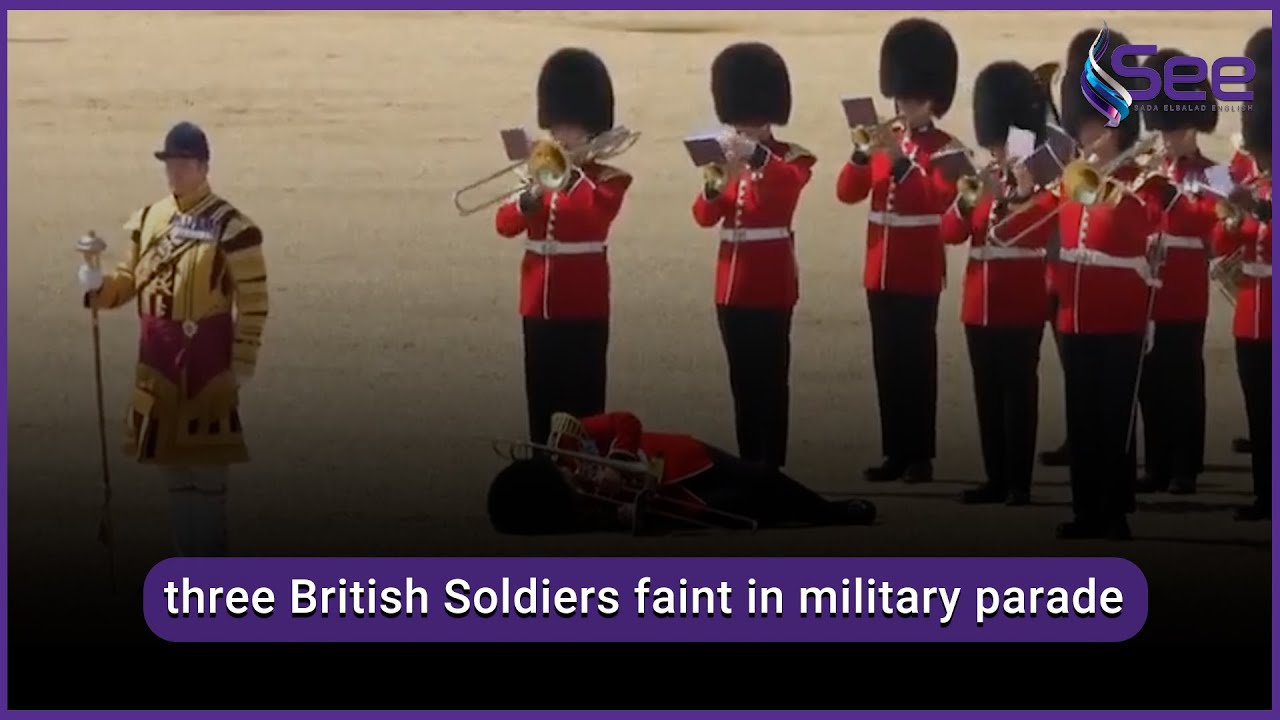 three British Soldiers faint in military parade - YouTube