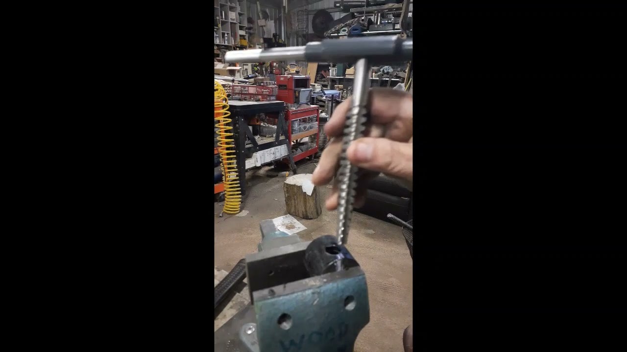 Tapping Delrin a practice run for making leadscrew nuts - YouTube