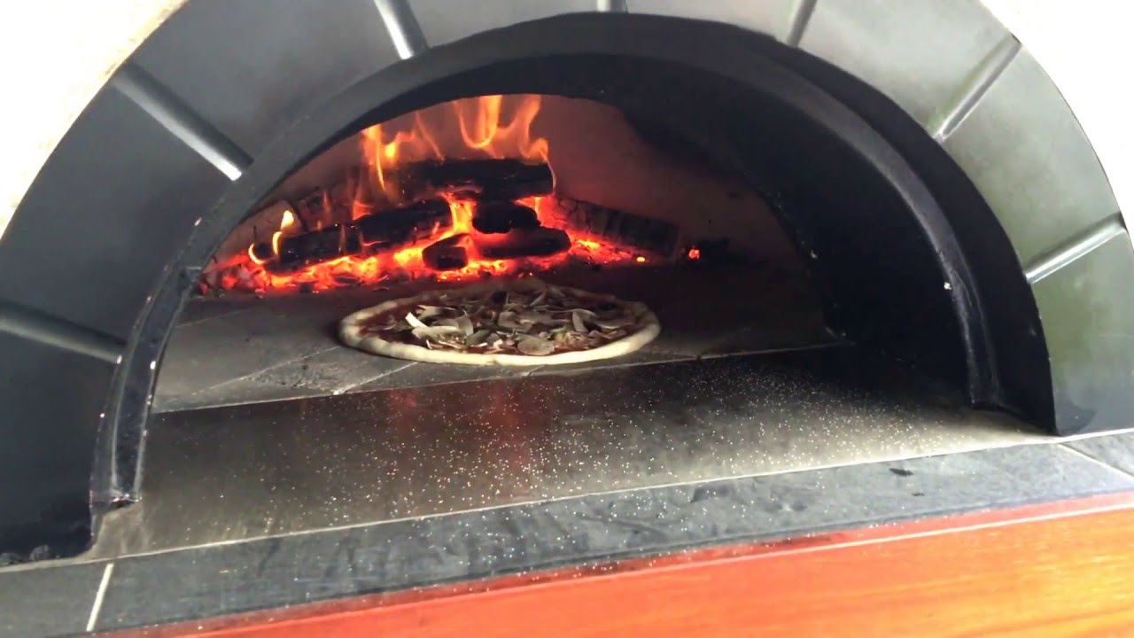 Neapolitan style pizza in the elite woodfired pizza oven - YouTube