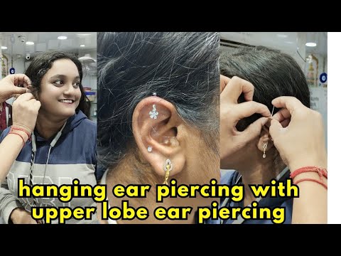 upper lobe ear piercing/hanging earpiercing with needle/#trending # ...