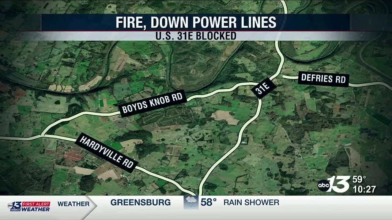 Traffic moving after structure fire, down power lines block ...