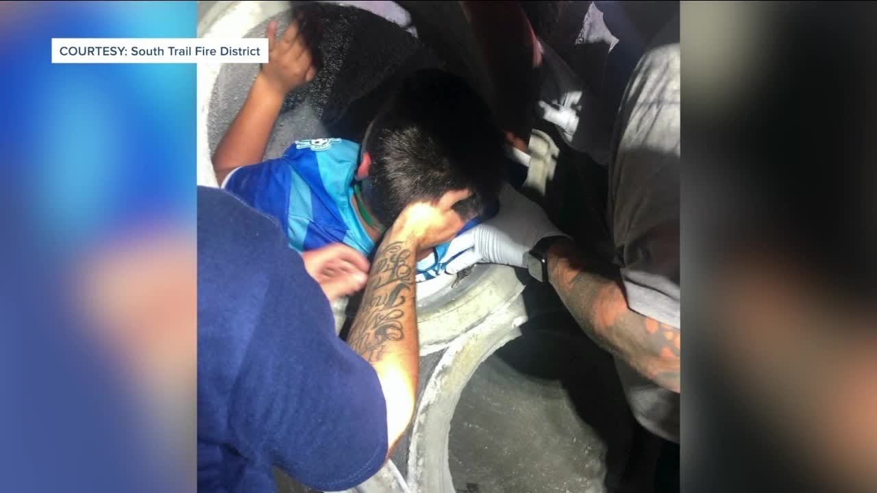 Boy stuck in sewer pipe - YouTube