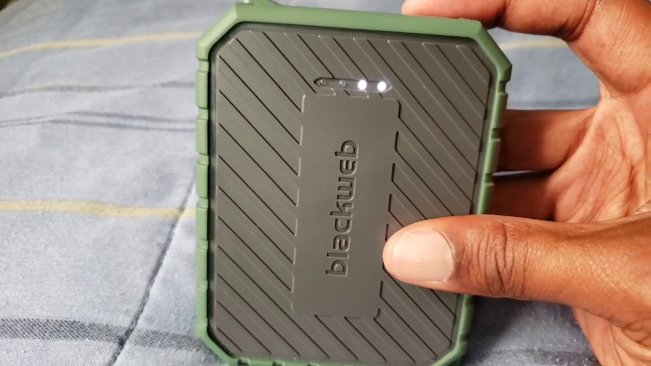 Black Web battery pack that you can take on the go in has a flashlight ...