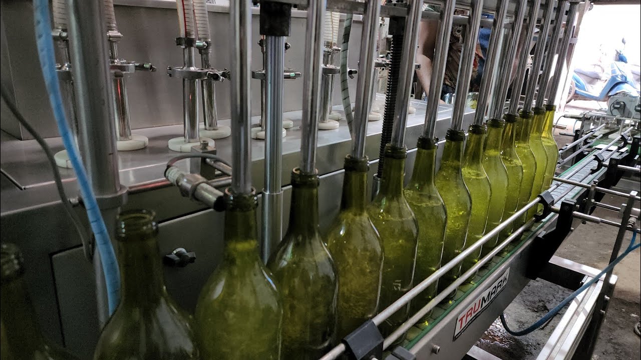 12 HEAD SERVO DRIVEN LIQUID FILLING MACHINE, LIQUOR WHISKY BOTTLING ...