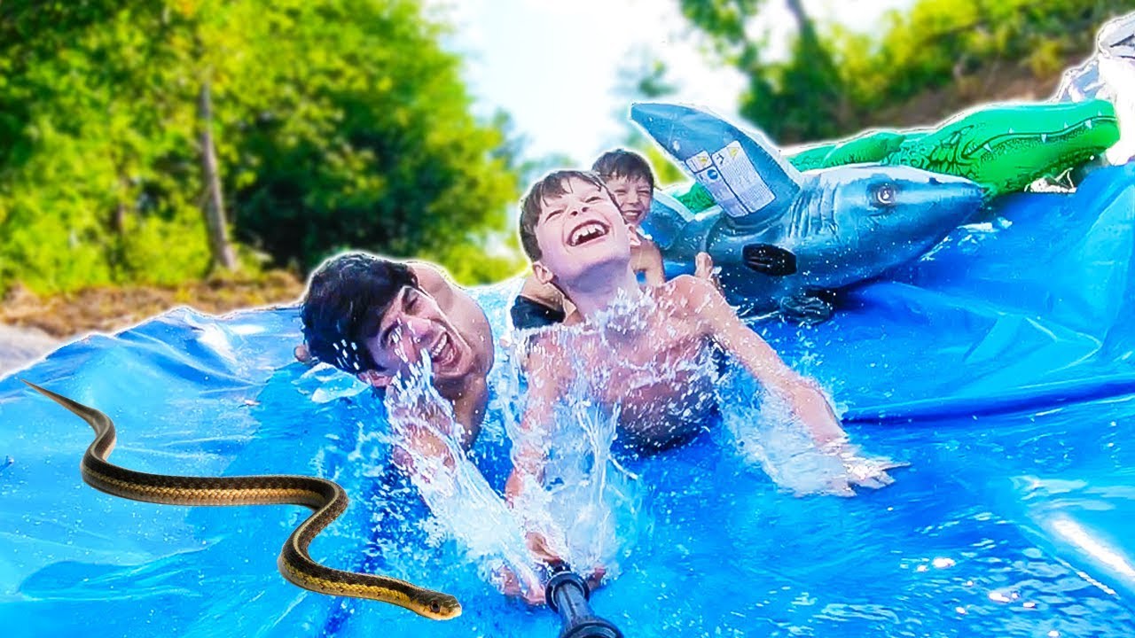 EPiC BACKYARD WATERSLIDE with SNAKES!?! 💦 - YouTube