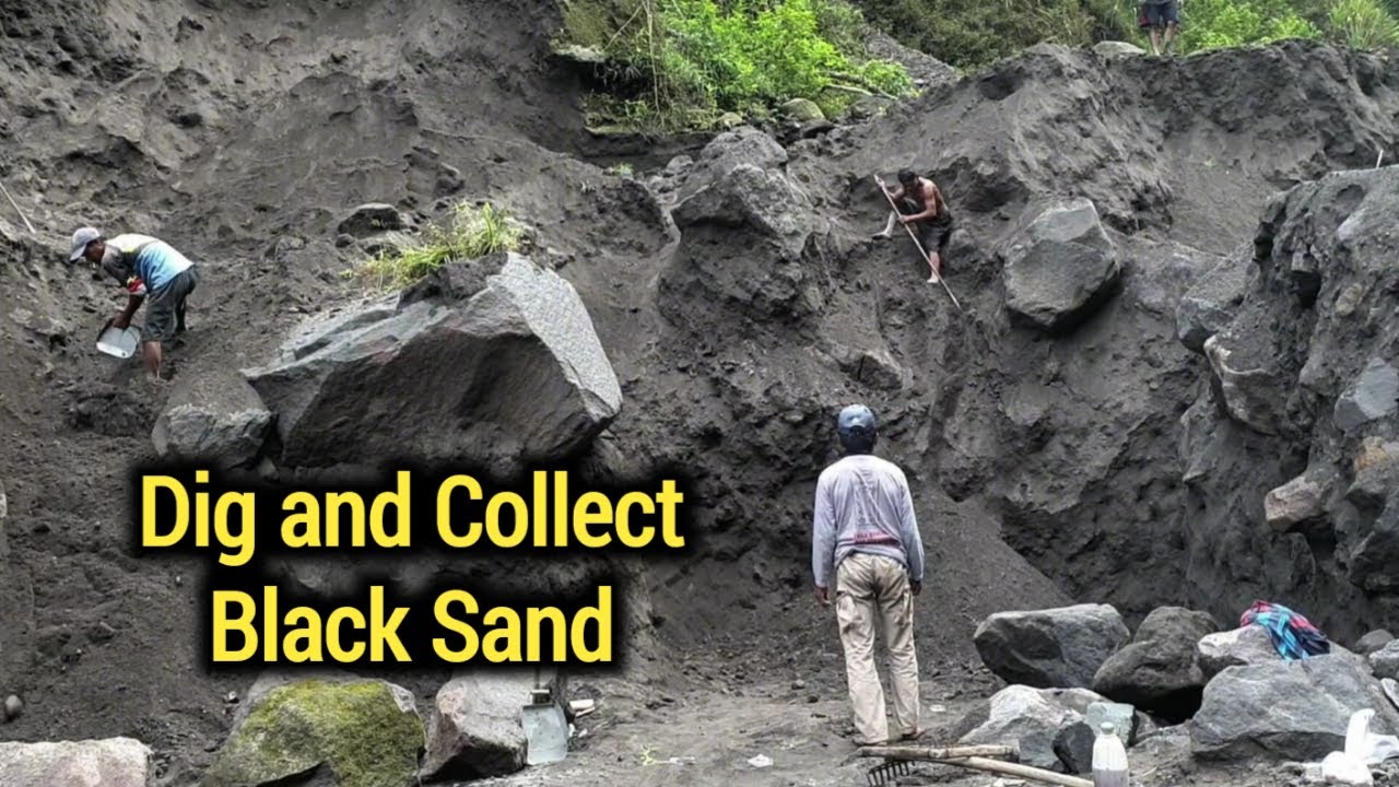 the miners dig and collect black sand - YouTube