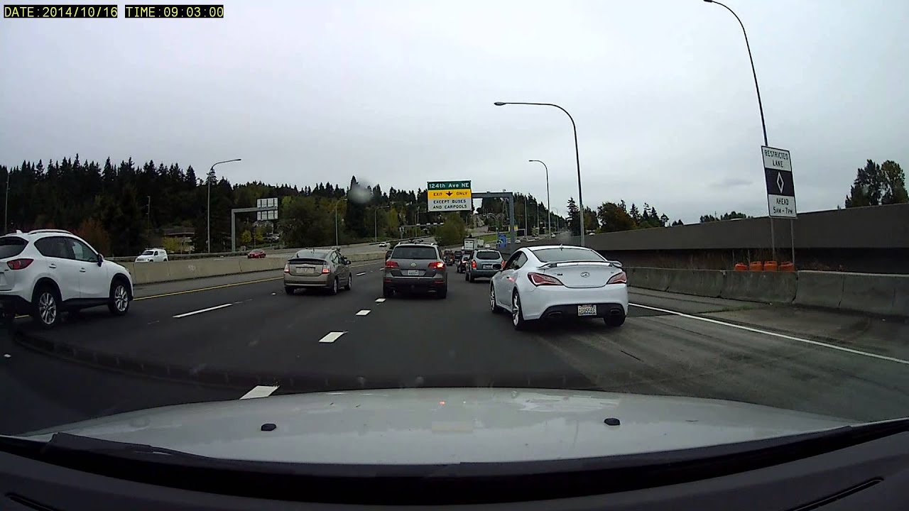 Forces way from left lane to exit only lane with merging traffic - YouTube