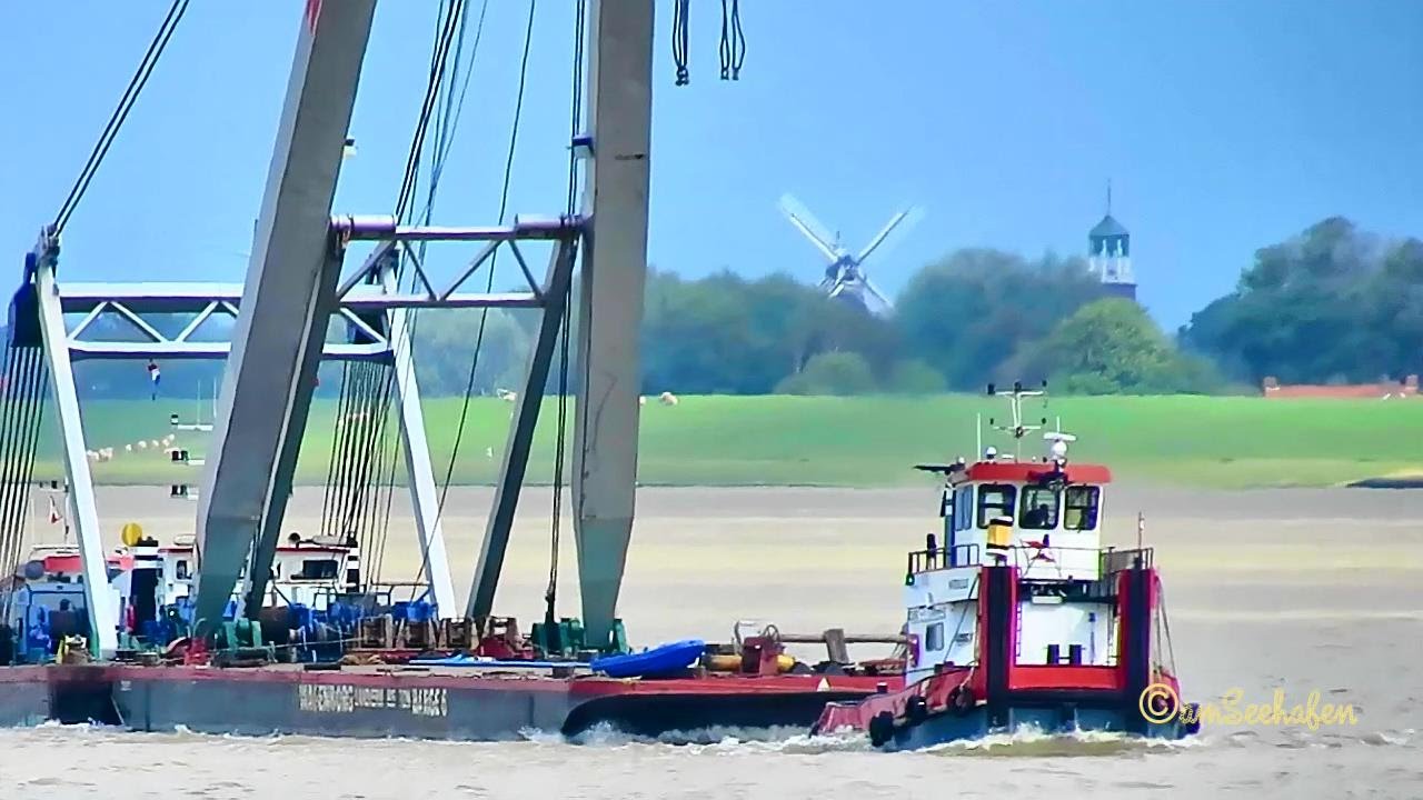 tugs WATERLELIE PB8981 and GYAS PD2424 towing heavy lift floating crane ...