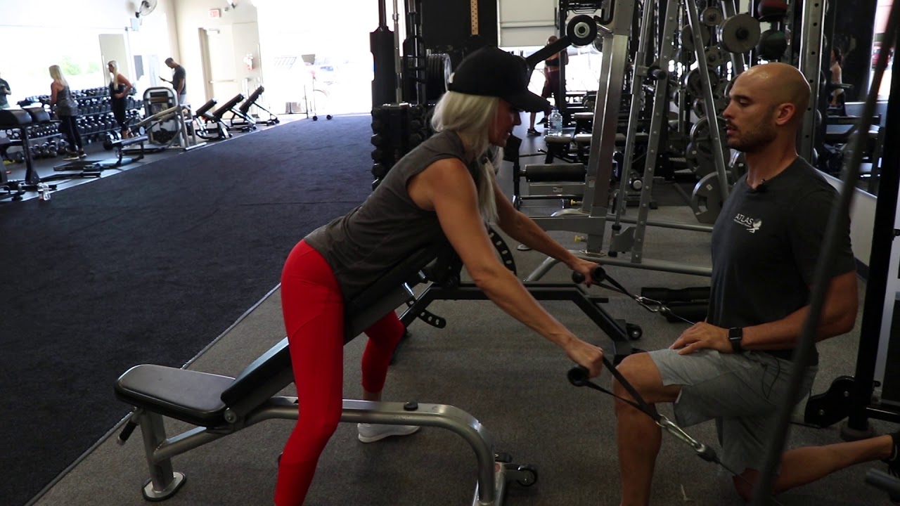 How to perform a cable row - YouTube
