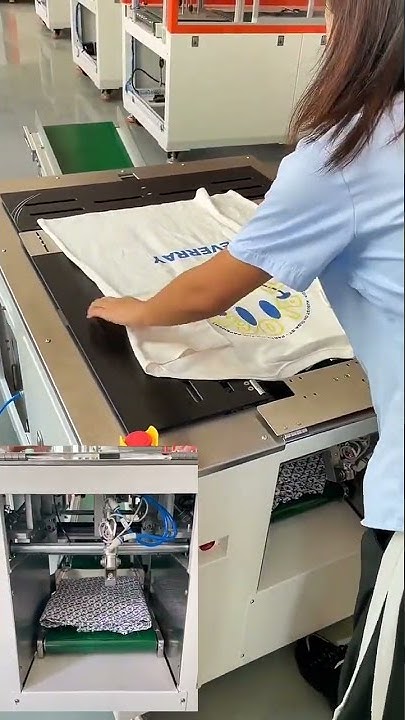 Automatic clothing folding machine - YouTube