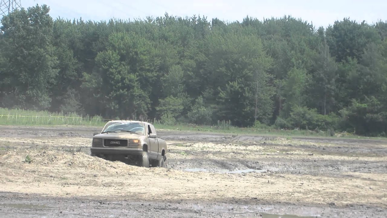 White GMC Mudding At Sundown - YouTube