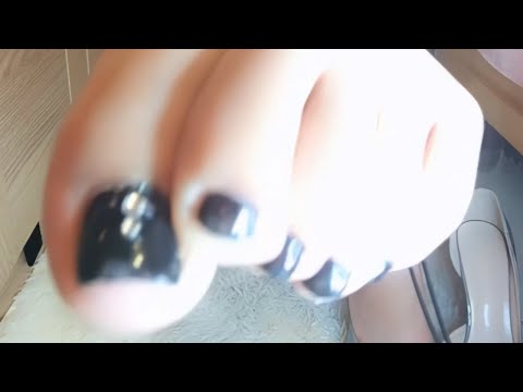 Attractive girl shows feet and her puppy in front of camera No 07