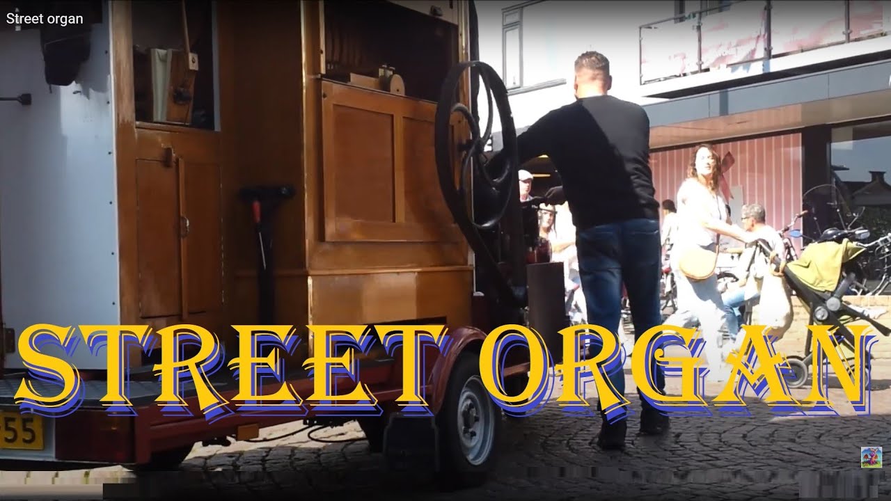 Street organ. Barrel organ also called roller organ or crank organ ...