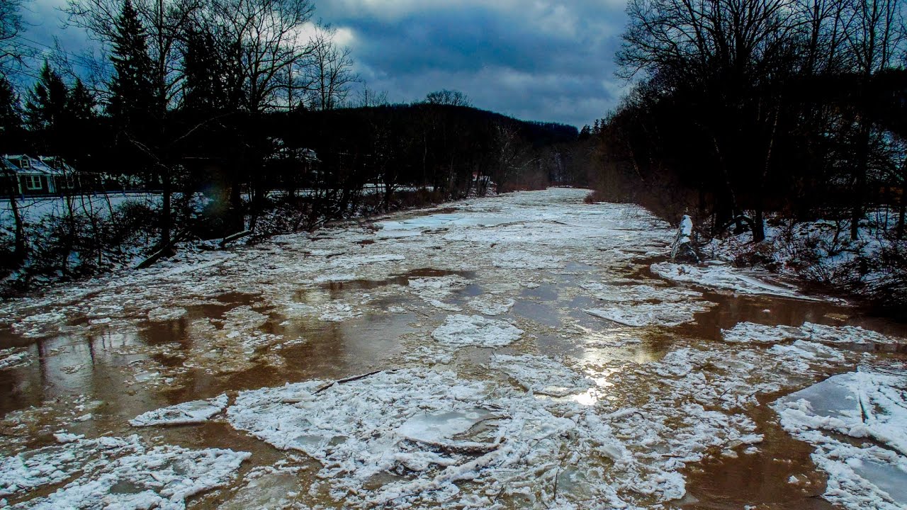 Ice Breaking & Flowing Down River - YouTube