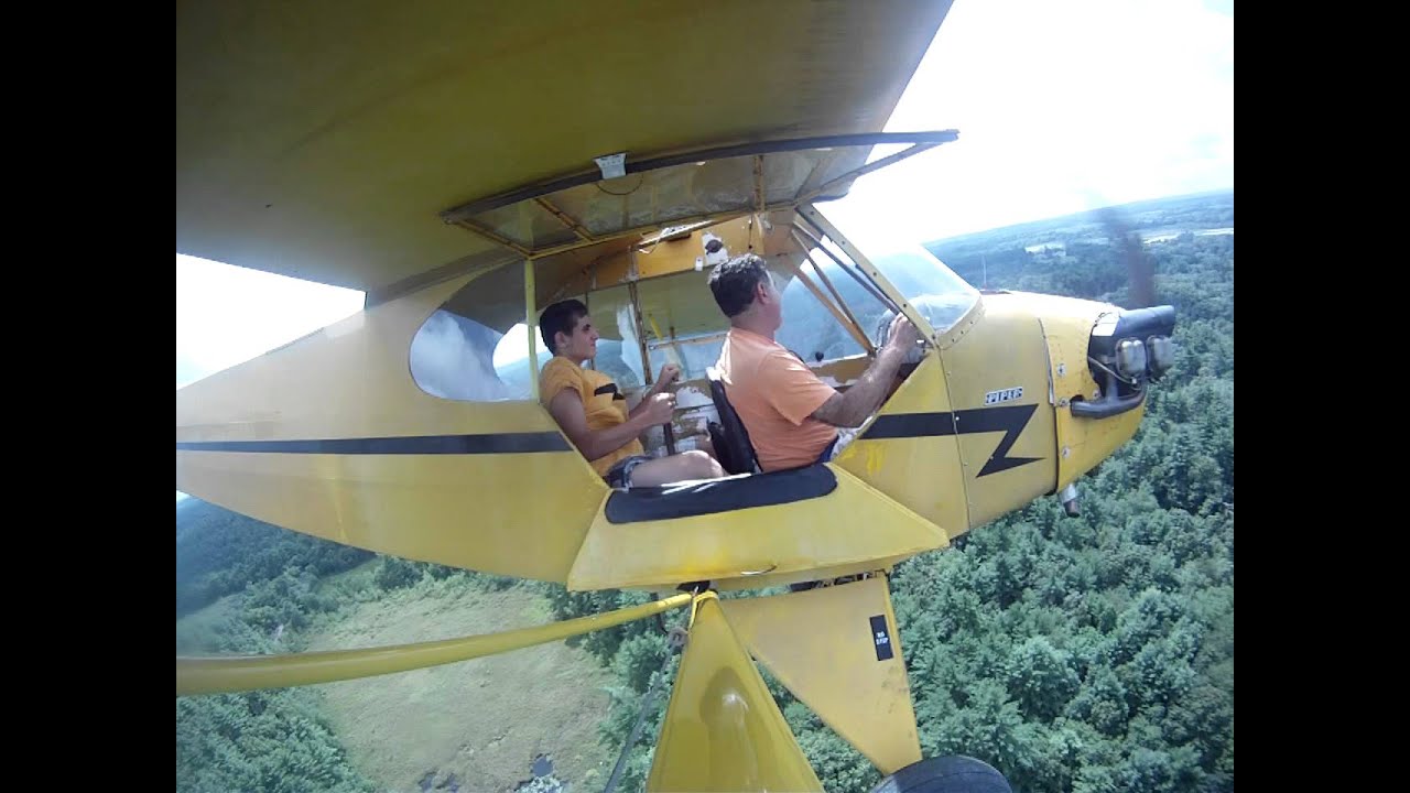 J3 CUB PILOT AT 14 MAX FLIES DAD AROUND THE PATCH - YouTube