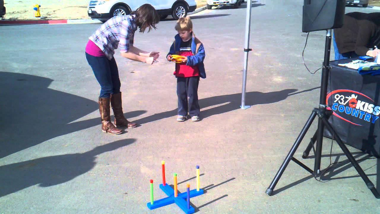 KISS COUNTRY'S Erica Pierce showing a young listener Ring Toss - YouTube