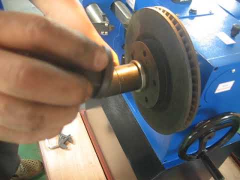 Skimming machine for brake disc and drum - YouTube