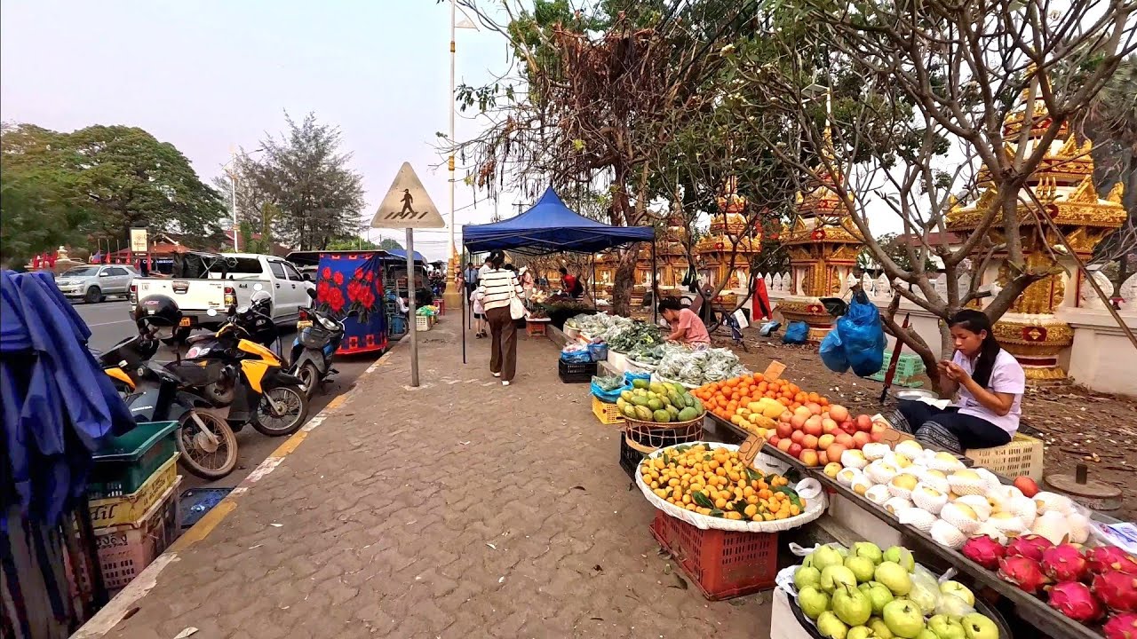 Walk with me from Patuxai to Thatluang / Laos is modernized - YouTube