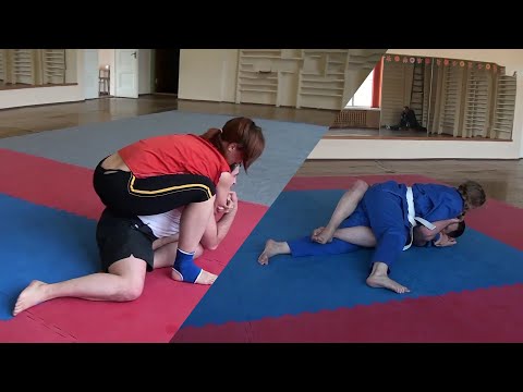 NC22  - Irina and Elena vs Villian. Mixed Wrestling. 2011