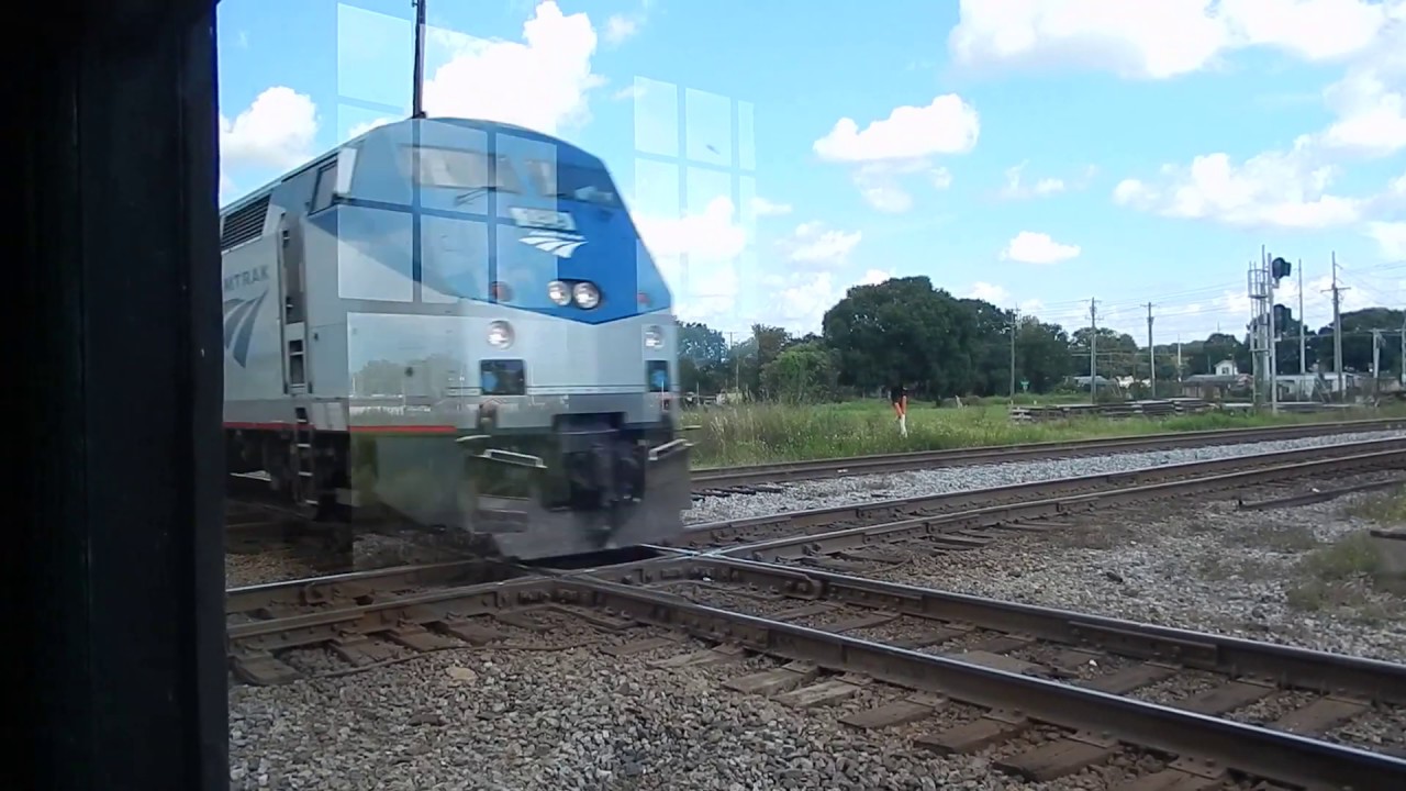 Short Amtrak train passes from the station - YouTube