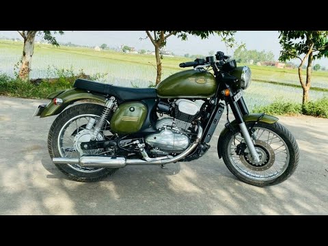 Jawa 42 with Royal Enfield bullet silencers (free flow exhausts) - YouTube