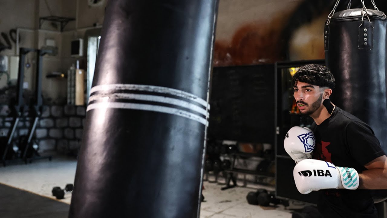 First Palestinian Olympic boxer fights hurdles before history - YouTube