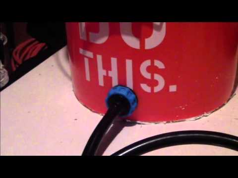 Gravity fed watering bucket - YouTube