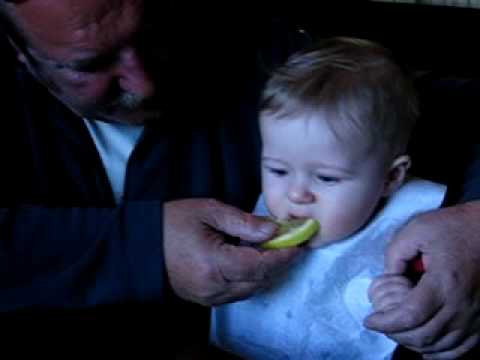 Baby sucking a lemon - YouTube