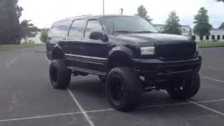 Lifted ford excursion all black
