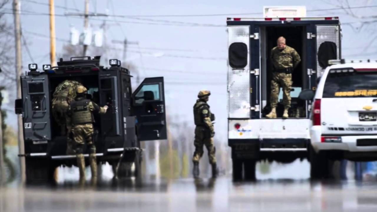 Police surround home of barricaded gunman - YouTube