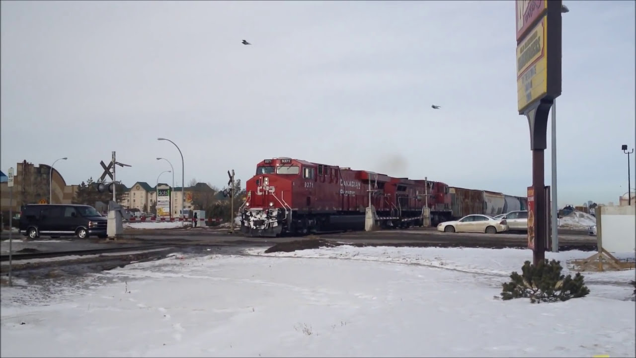 CP 9371 South (Mixed) W/ DPU @ 34th St. Crossing Edmonton Alberta 22FEB13 ES44AC 9371 Leading ...