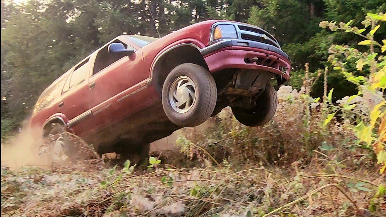 JUMPING a Chevy Blazer on a DIRT BIKE track - YouTube