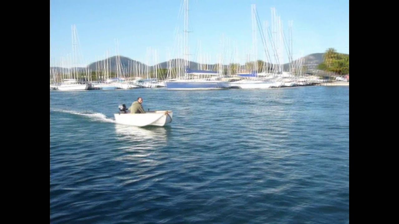 Fliptail 9 folding dinghy on the plane at over ten knots with just 2 ...