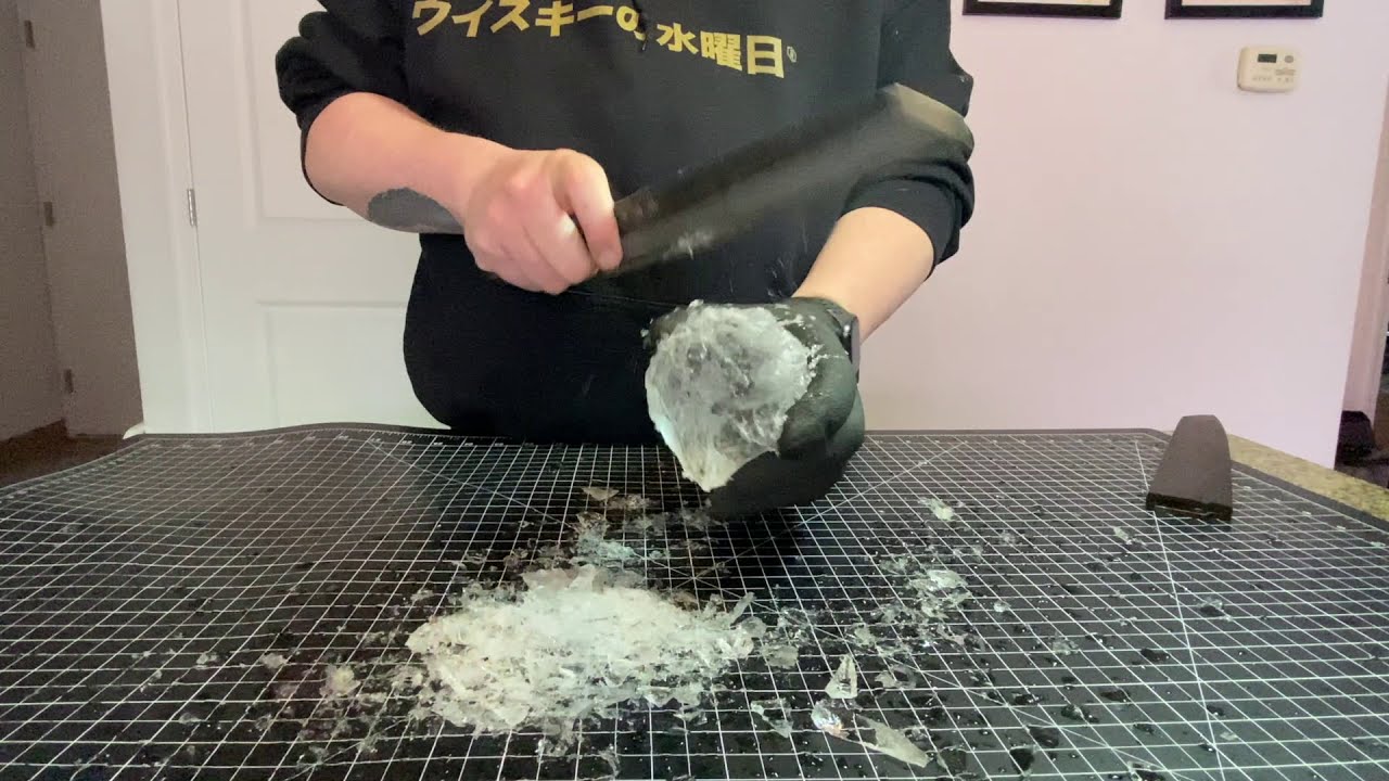 Knife Chipping Ice to make a Sphere - YouTube