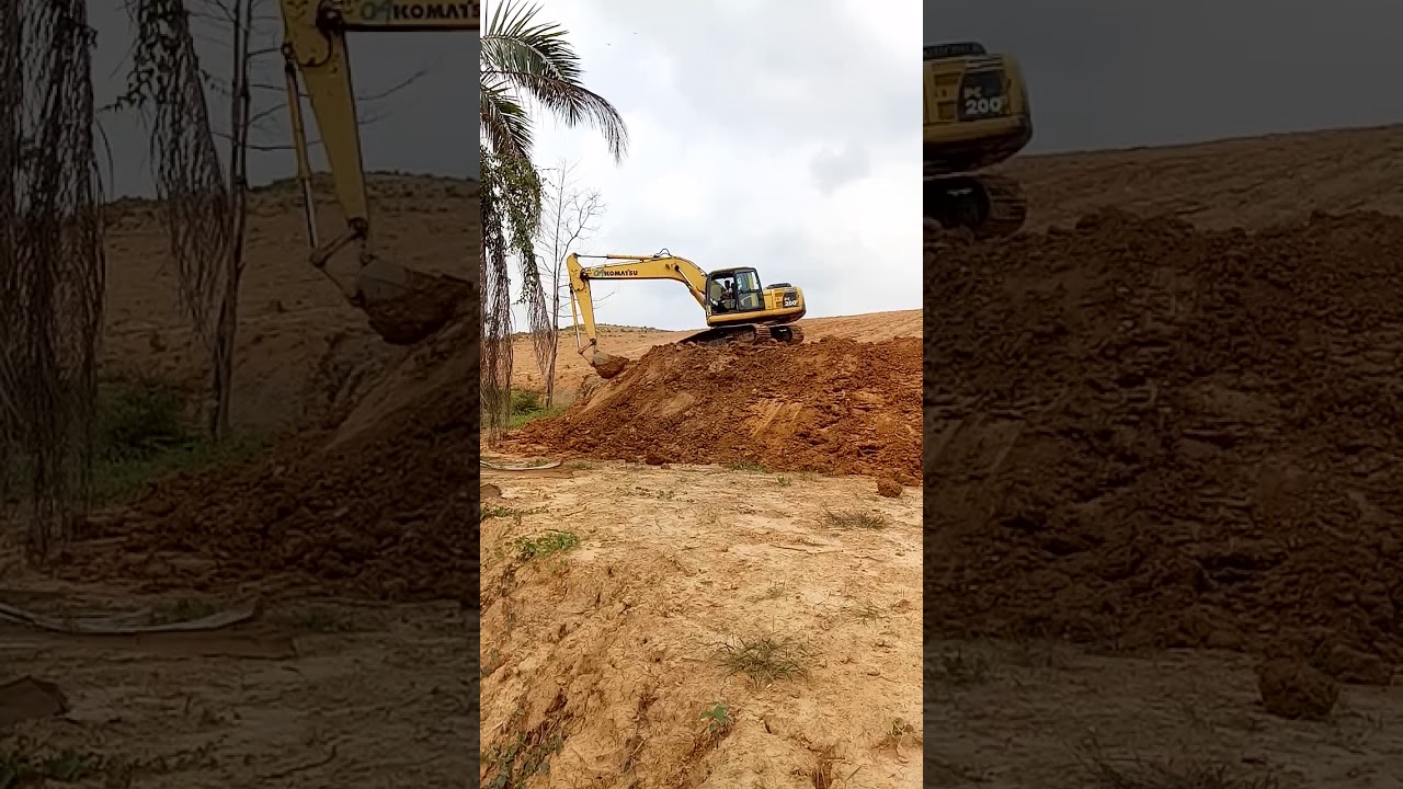 pembuatan tanggul tanah dengan exavator disekitaran settaling pond ...