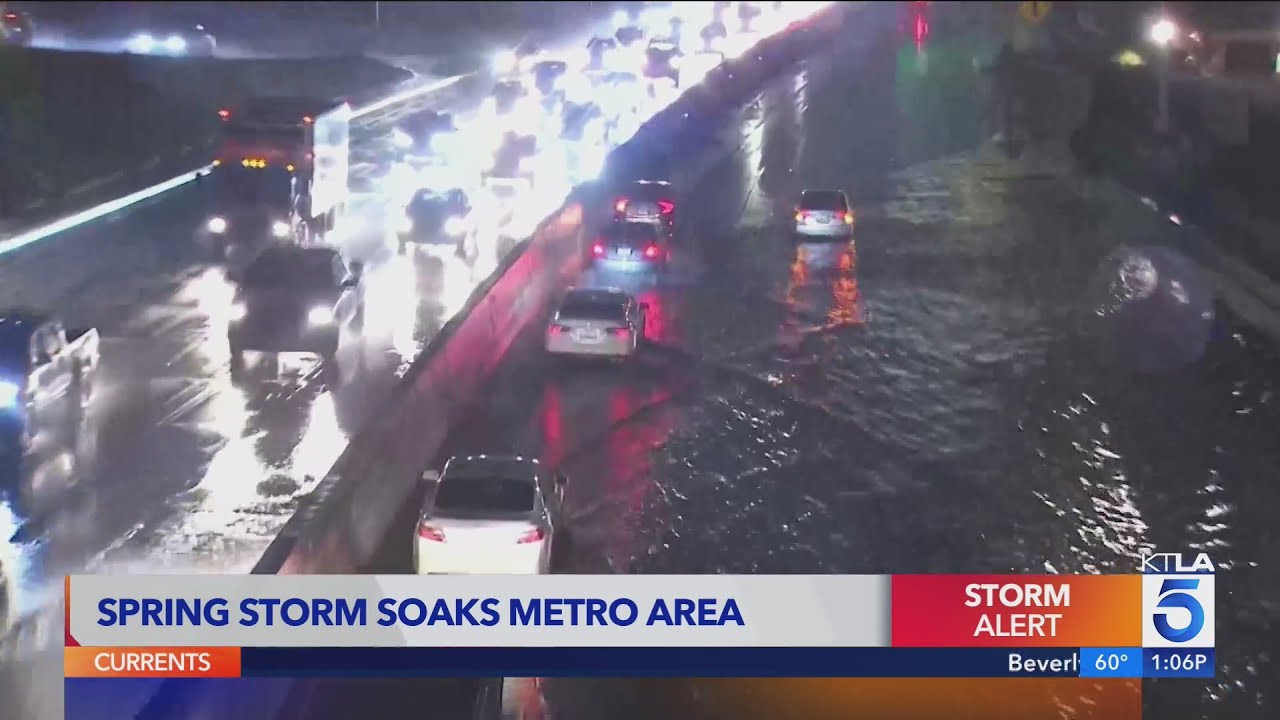 Another storm hits Southern California with heavy rain, snow - YouTube