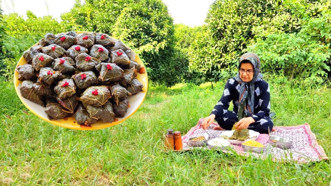Dolma | Village Style Delicious Grape Leaves Dolma With Tomato Sauce ...