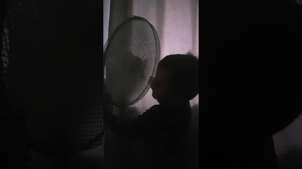 Kid singing into a fan..funny sound. - YouTube