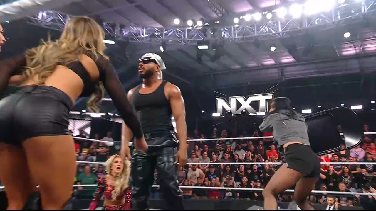 Ashantee gets hit with a steel chair in the attempt to save Karmen ...