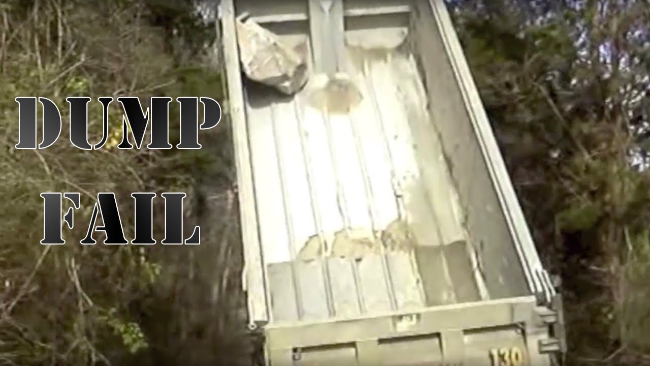 Dump Truck * FAIL* Tailgate snaps off by stuck rock - YouTube