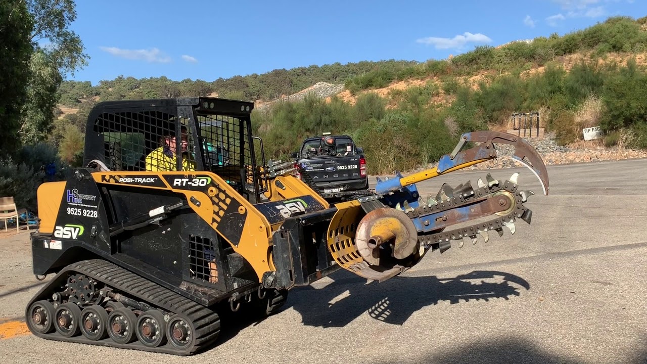 Connecting a posi track to a trencher attachment - YouTube