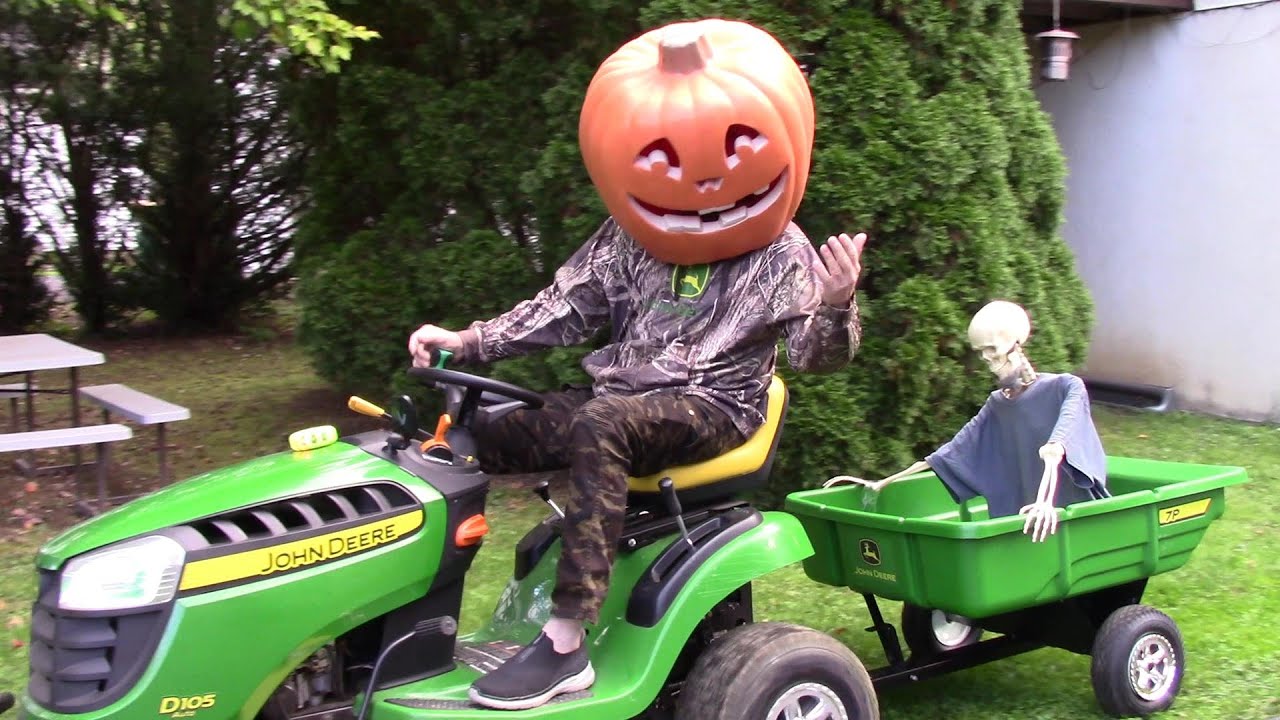 Pumpkin Head + Skully mow the lawn! John Deere D105 - YouTube