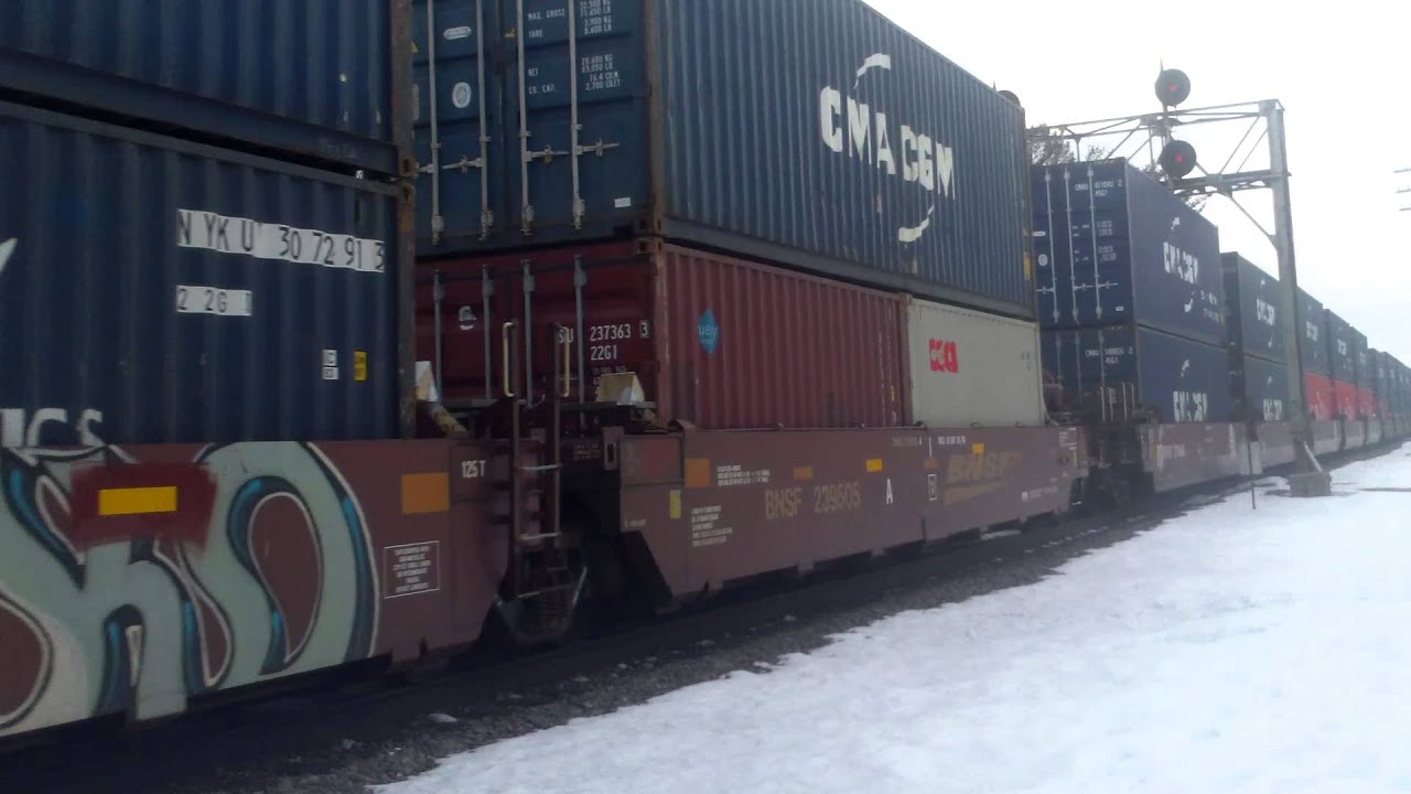 BNSF 7838 leads eastbound stack with BNSF H3 DPU 8247 - YouTube