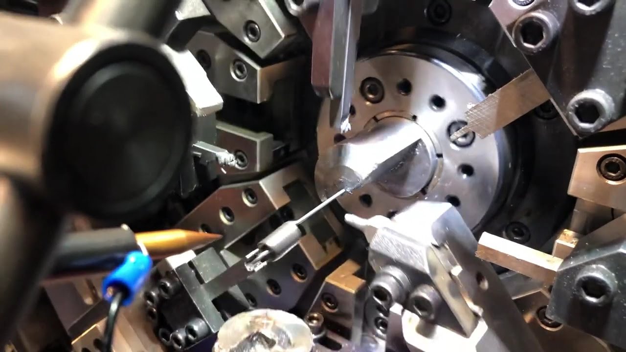 Spring making machine - bends wire and coils spring - YouTube