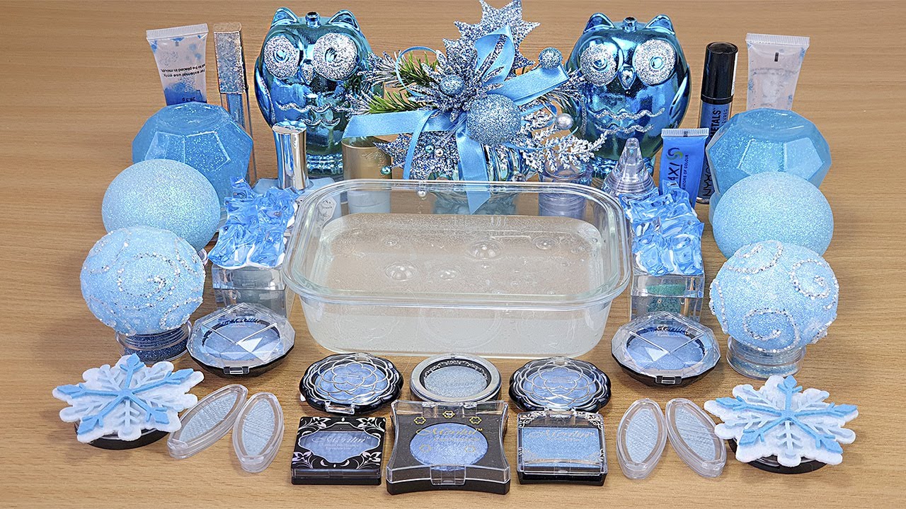 ICE BLUE SLIME Mixing makeup and glitter into Clear Slime Satisfying ...