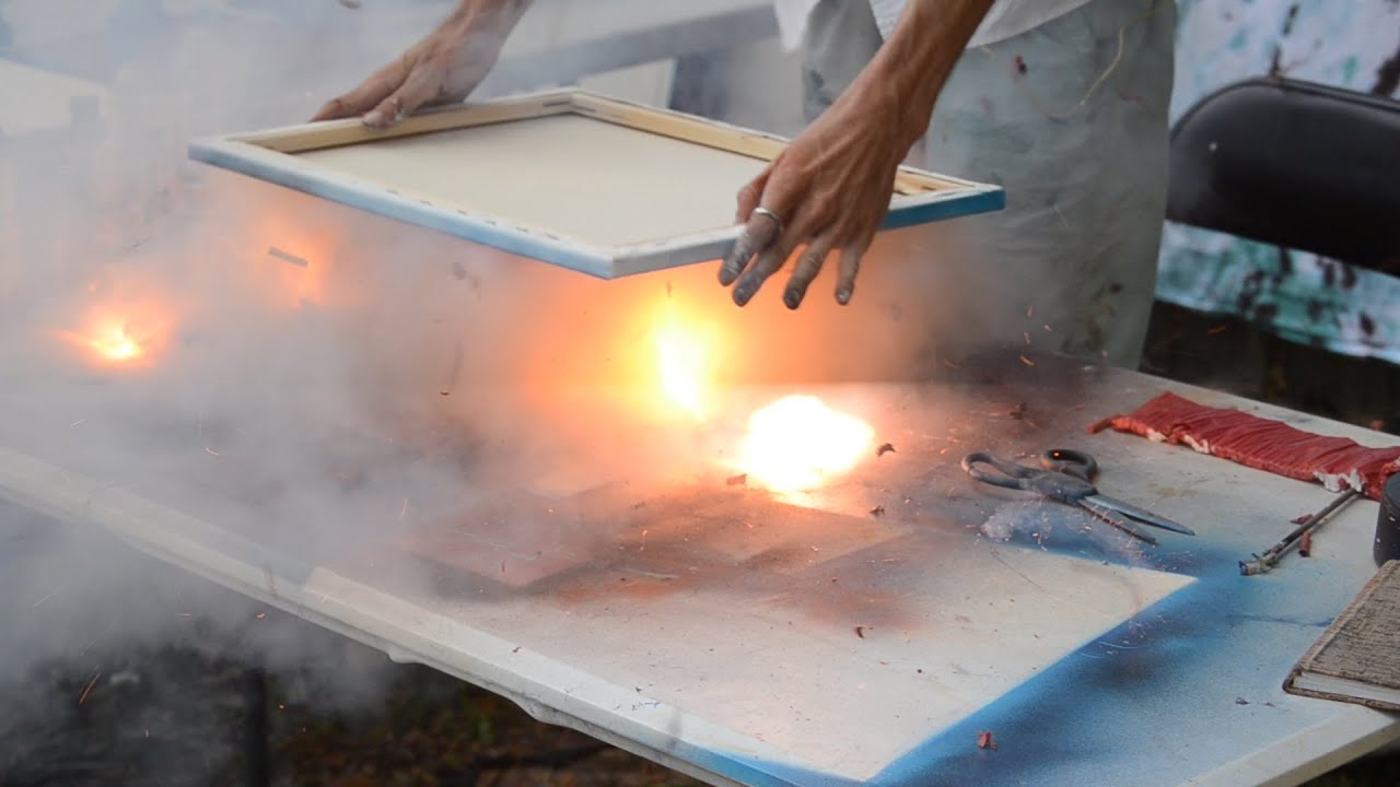 This artist makes paintings with firecracker explosions - YouTube