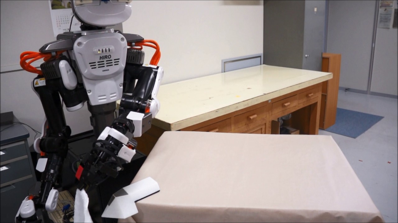 Unfolding an Item of Rectangular Clothing Using a Single Arm and an ...