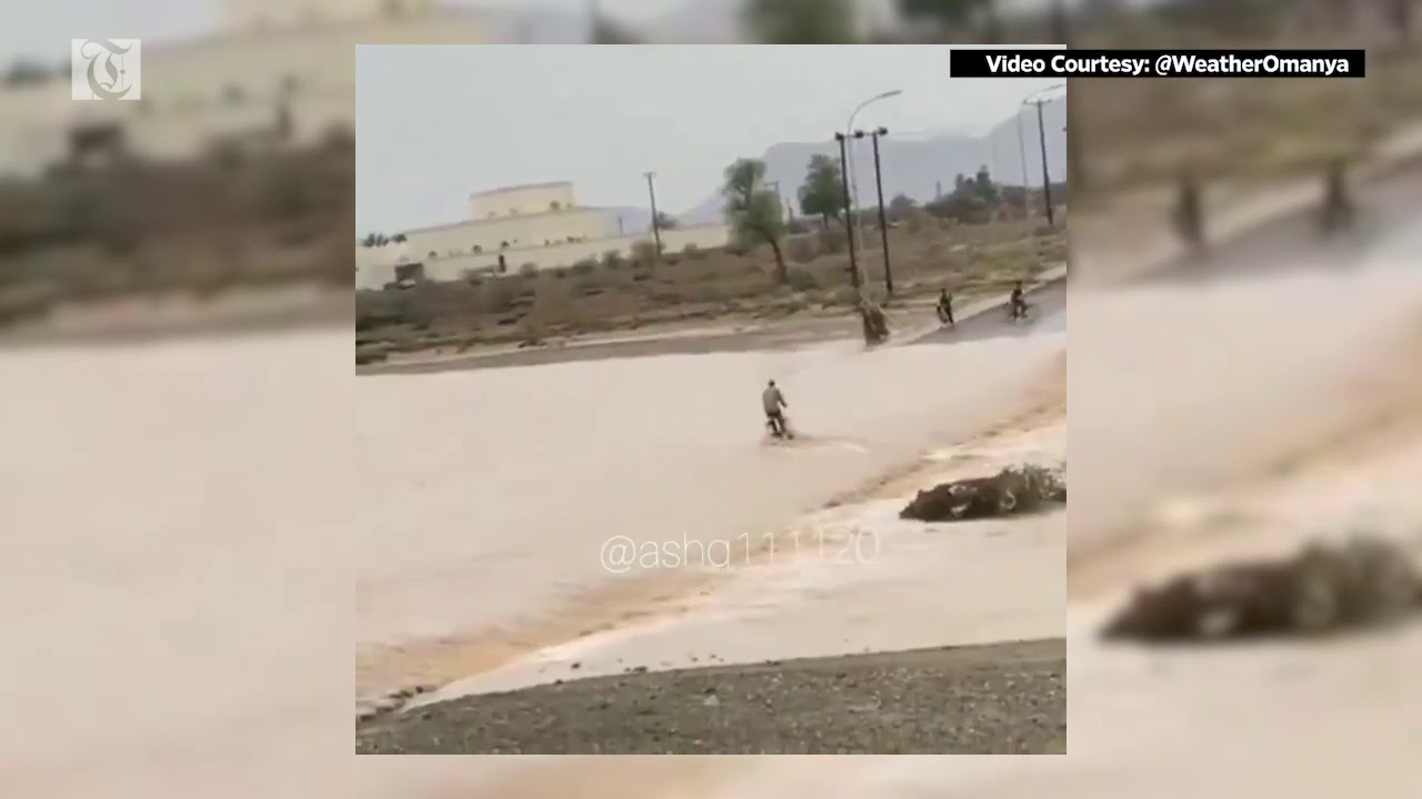 Expat attempts to cross dangerous wadi during floods - YouTube