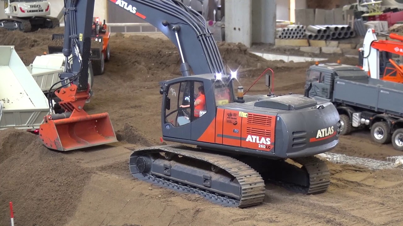 Atlas LC 260 Excavator works on dike construction - YouTube