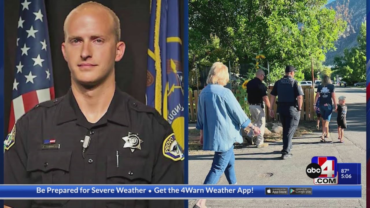 Provo police officers walk son of fallen officer to school - YouTube